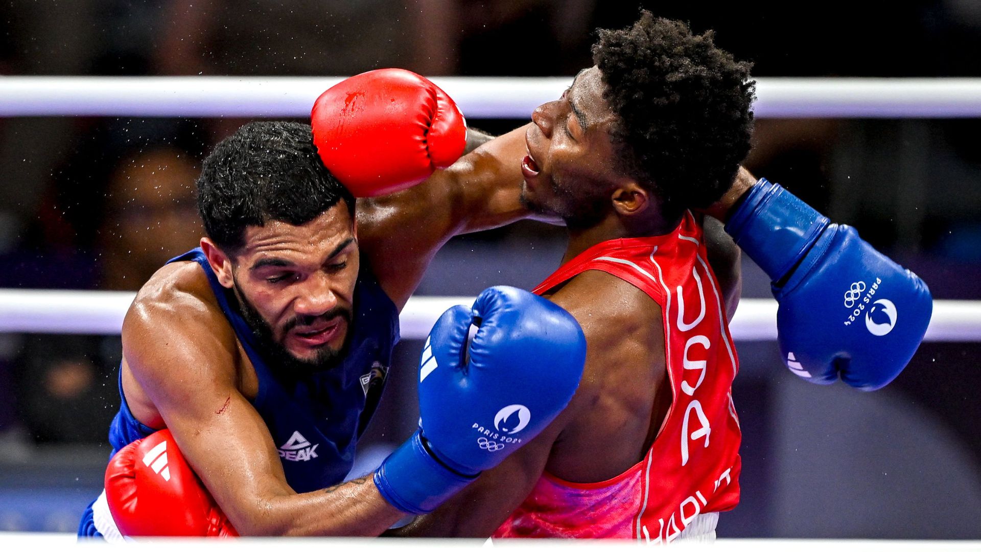Team USA's Harvey downs Oliveira, books boxing QF spot | NBC Olympics