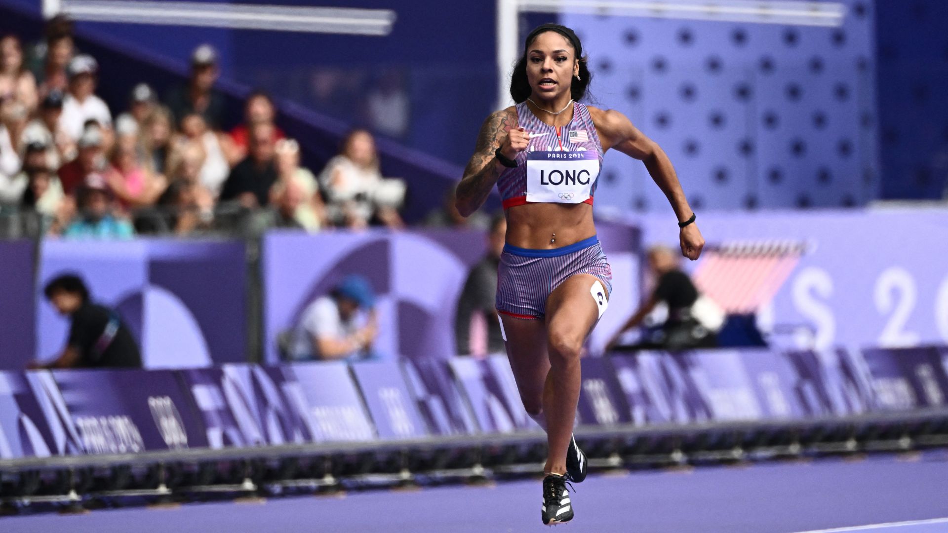 McKenzie Long tops her heat in the 200m to make the semis | NBC Olympics